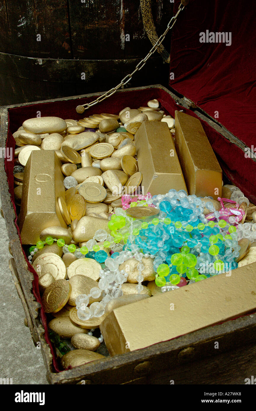 Treasure chest filled with gold coins and bars Stock Photo - Alamy