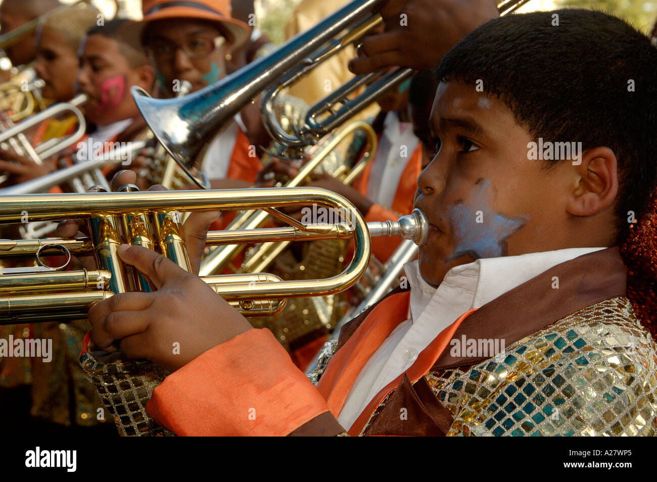 Young coloured boy playing trumpet in Cape Minstrel band Cape Town ...