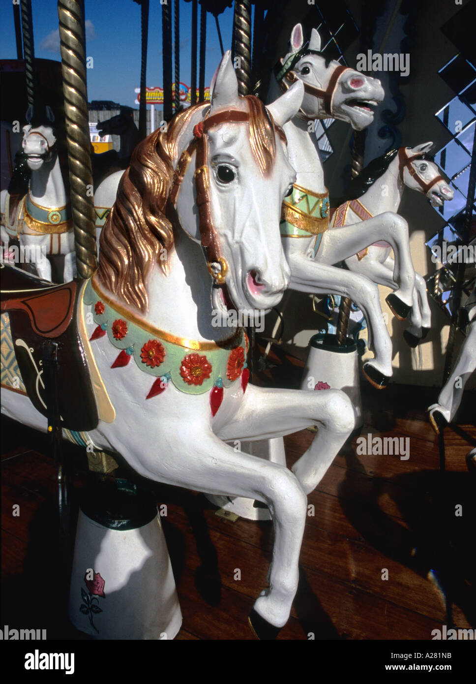 Children's traditional fairground roundabout with horses on Great ...