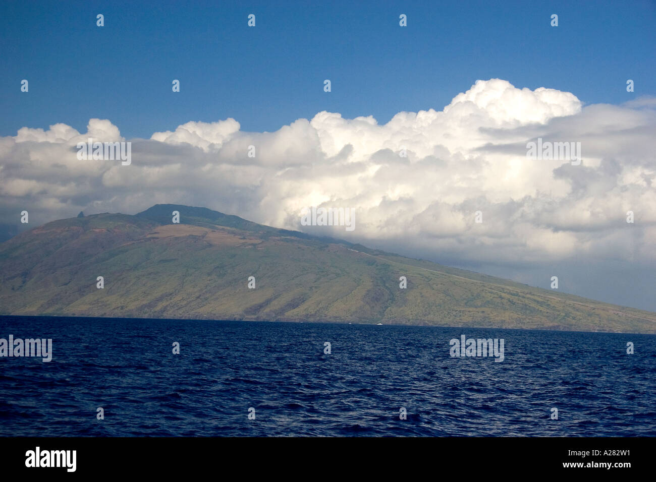 Clouds hang over the island of Maui, Hawaii Stock Photo - Alamy