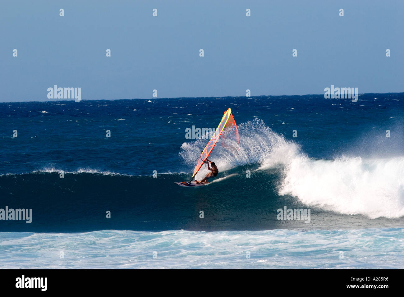 Windsurfing in the pacific ocean off the island of Maui, Hawaii Stock ...