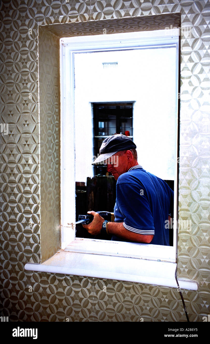 Man Fitting New Window Double Glazed Stock Photo - Alamy