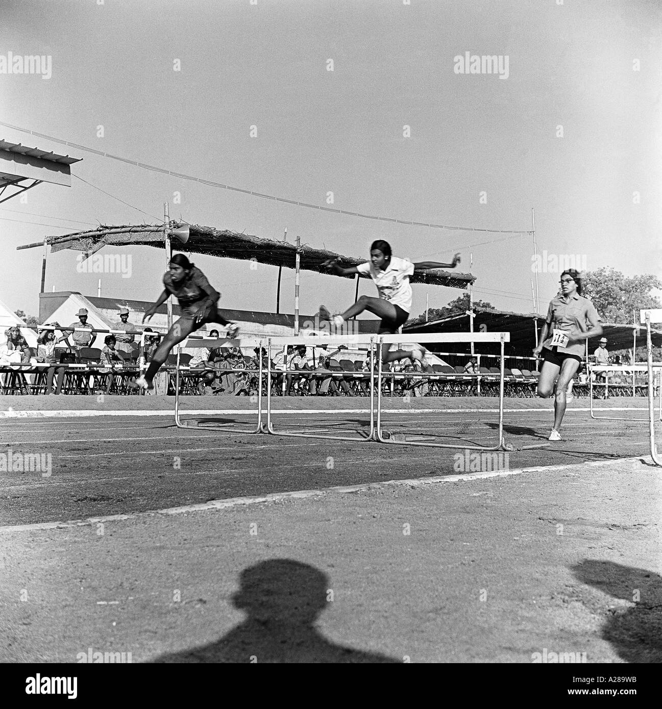 Hurdles running Black and White Stock Photos & Images - Alamy