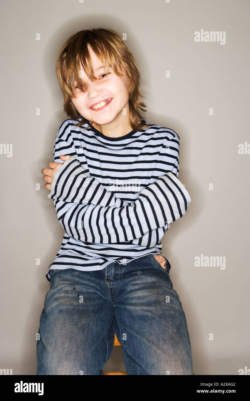 PORTRAIT OF 11 YEAR OLD BOY SITTING ON STOOL SMILING HAPPY ARMS Stock ... PORTRAIT OF 11 YEAR OLD BOY SITTING ON STOOL SMILING HAPPY ARMS Stock ...