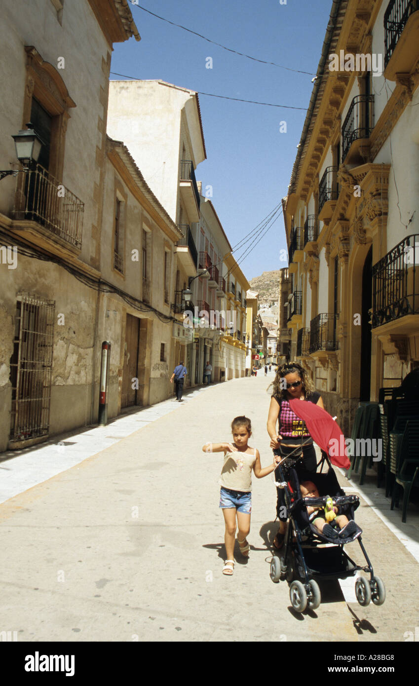 Child waving street scene hi-res stock photography and images - Alamy