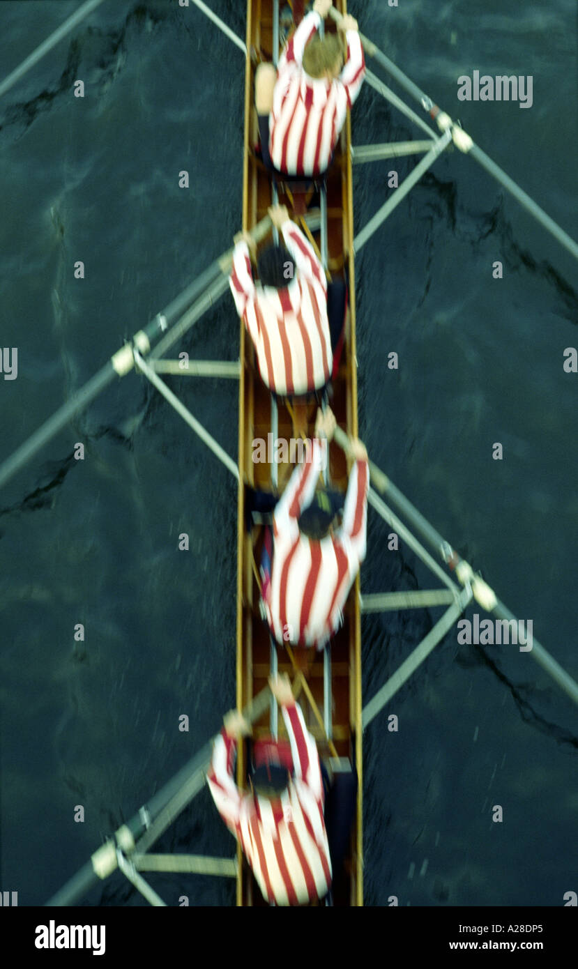 Overhead view of part of a rowing eight boat team showing deliberate ...