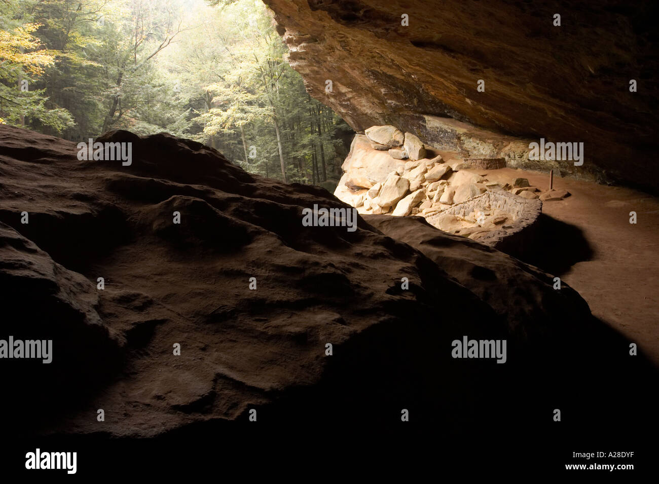 Peering out of a rock formation of Old Man's Cave in Hocking Hills ...