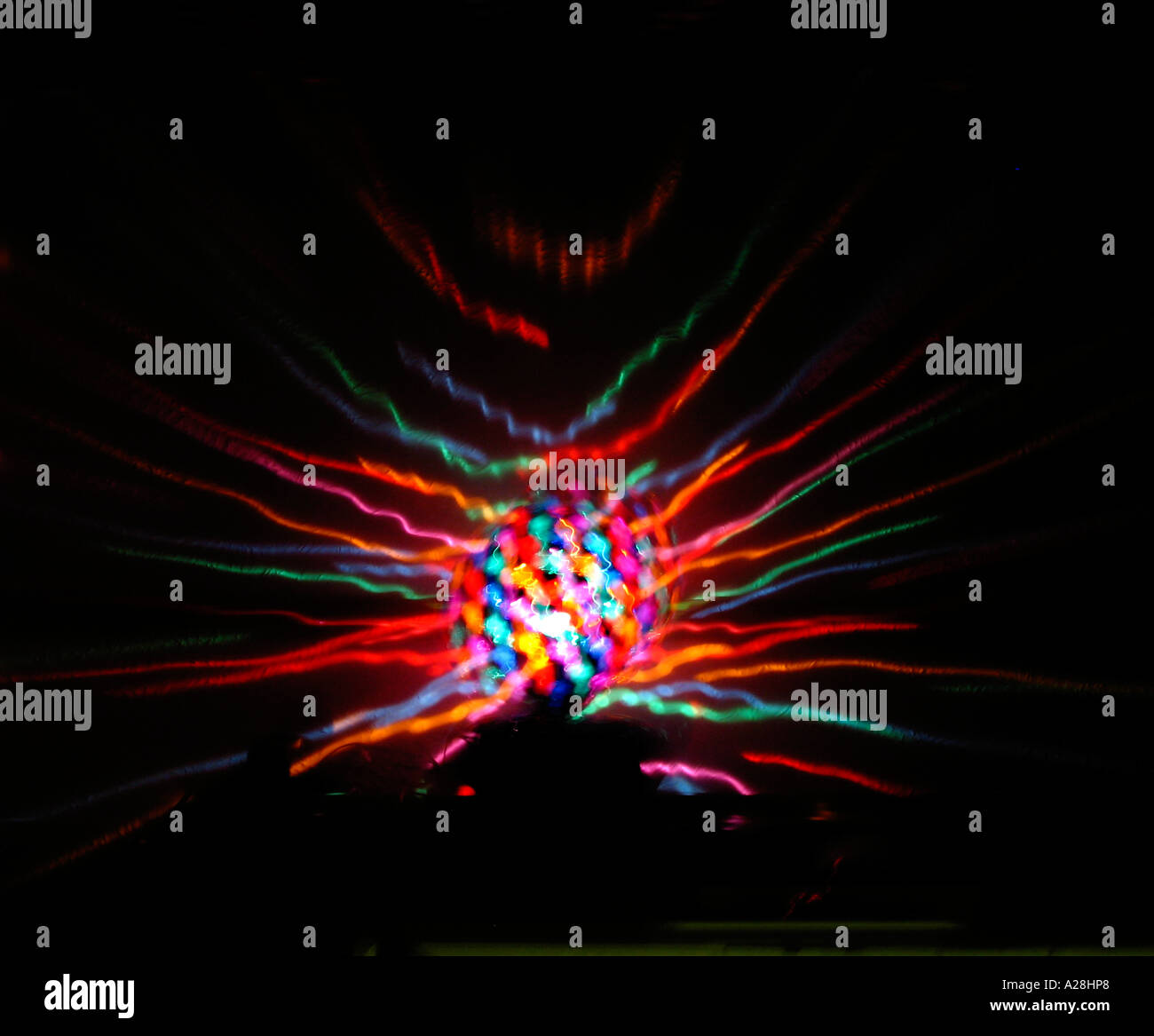 Disco ball light with slow shutter blur effect Stock Photo - Alamy