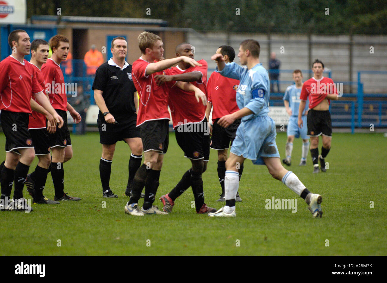 Football players fighting Stock Photo - Alamy