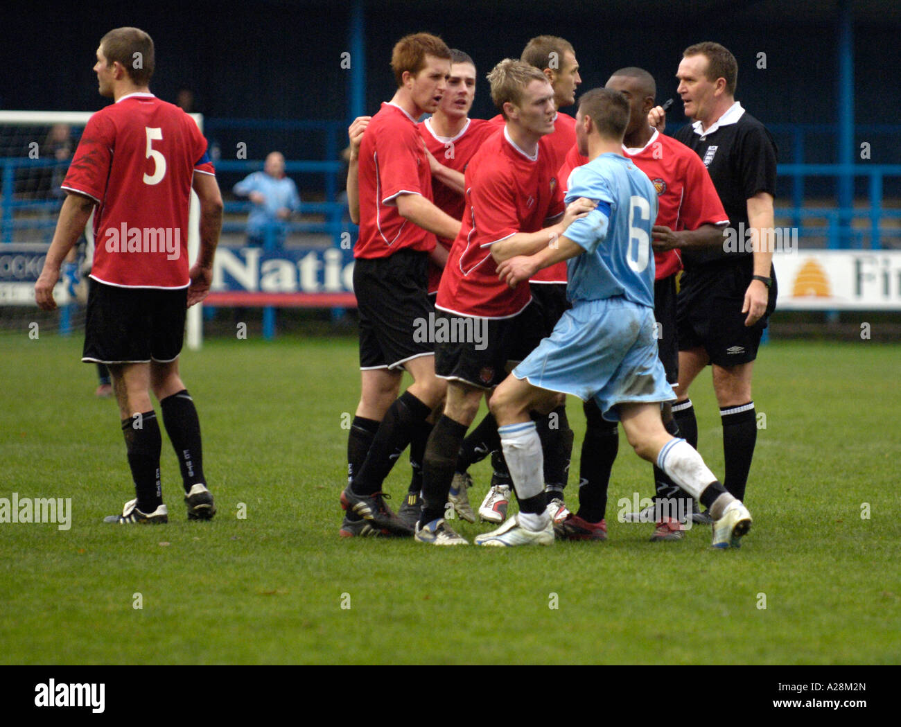 Football fighting hi-res stock photography and images - Alamy