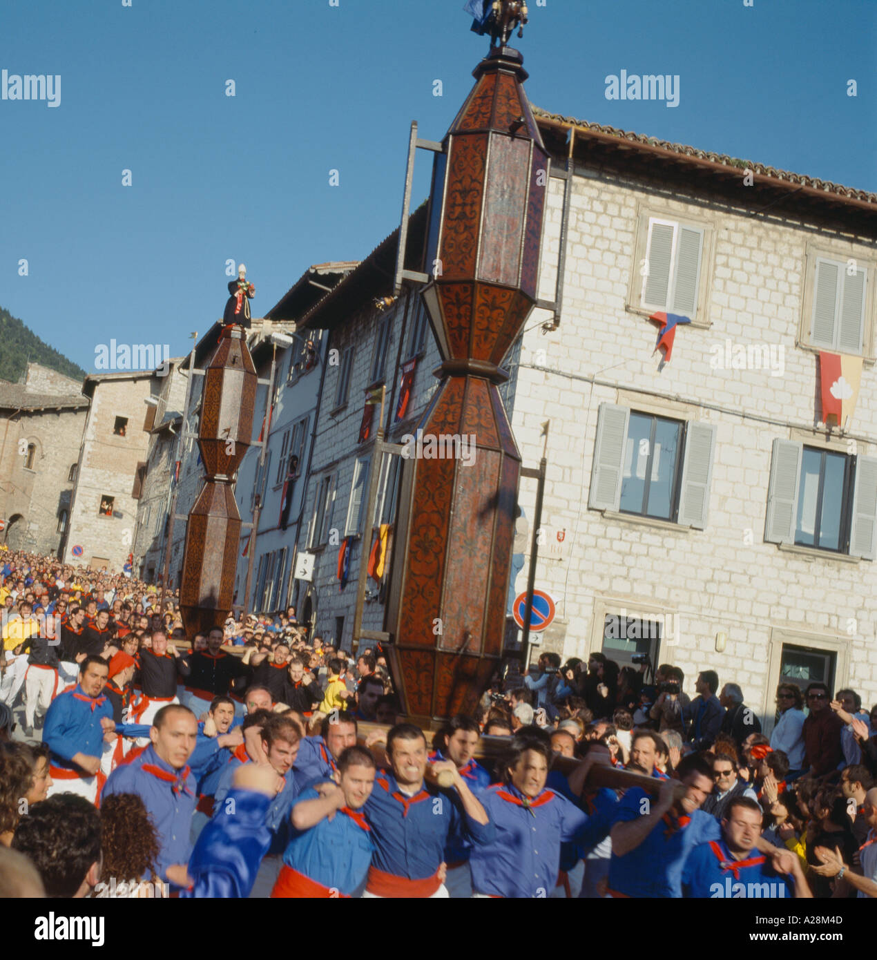 Corsa dei Ceri festival Gubbio, Umbria, Italy. Teams carry traditional ...