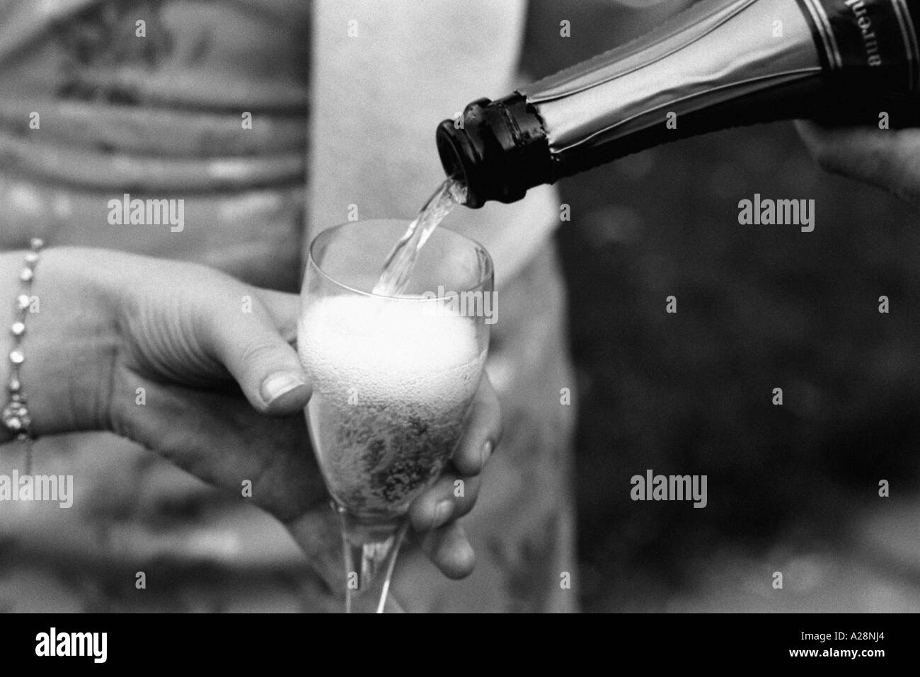 Girl glass champagne Black and White Stock Photos & Images - Alamy