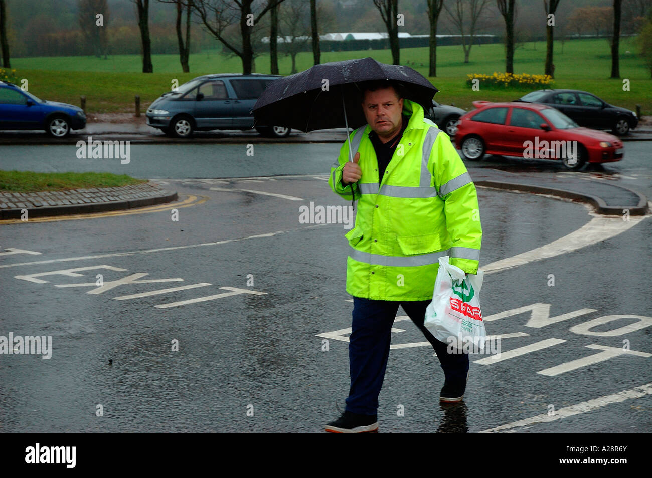 man coming into work Stock Photo - Alamy