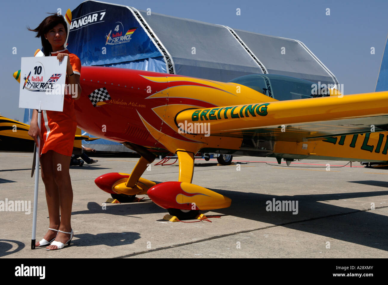Red Bull Air Race pilots with their planes Turkish promo girls on Red ...