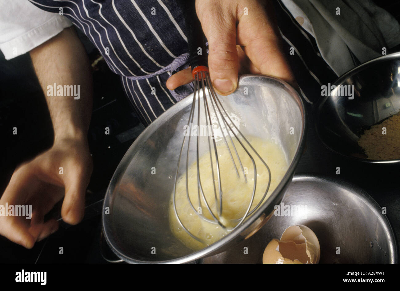chef whisking an egg Stock Photo - Alamy