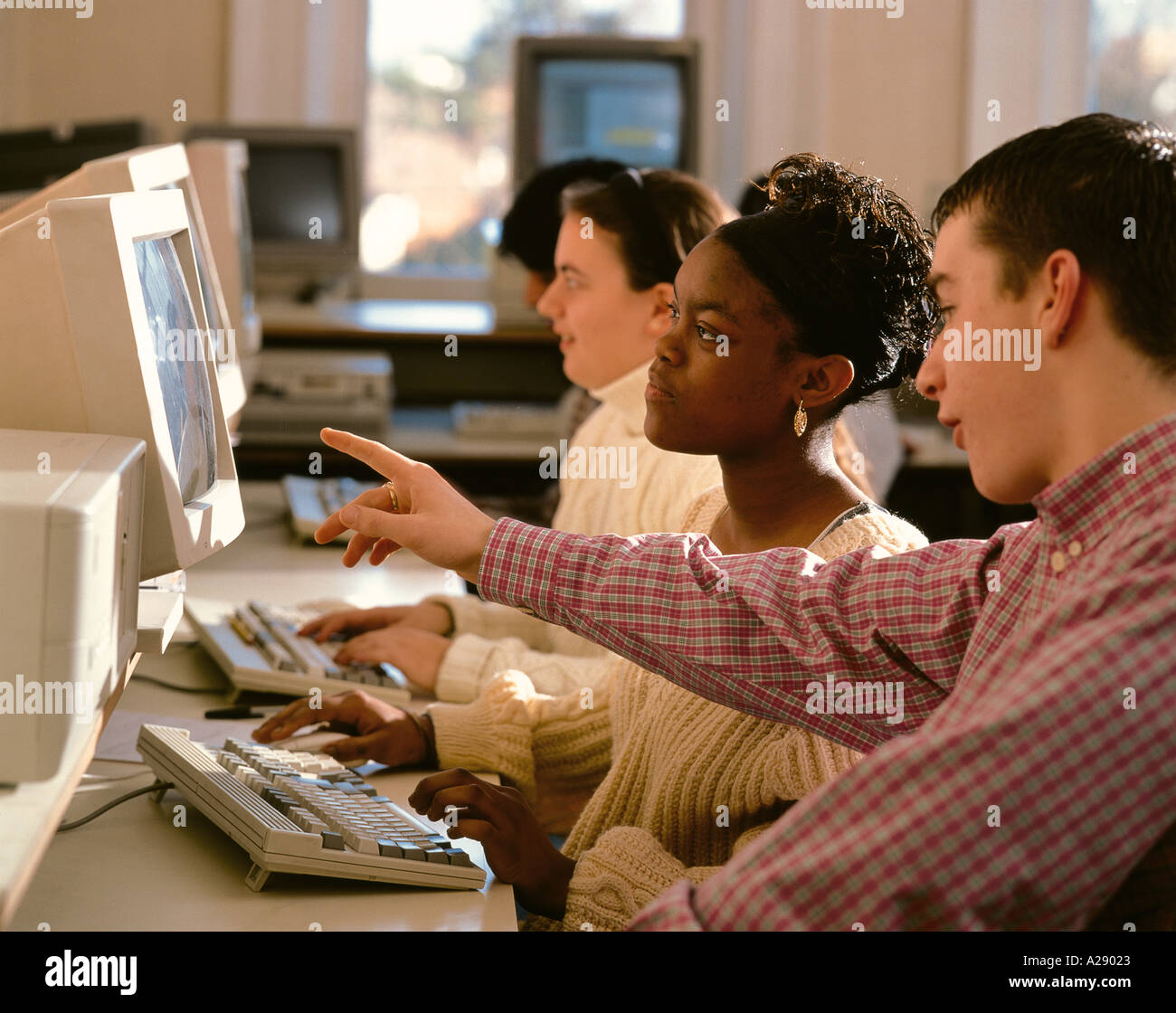 Black students using computers hi-res stock photography and images - Alamy