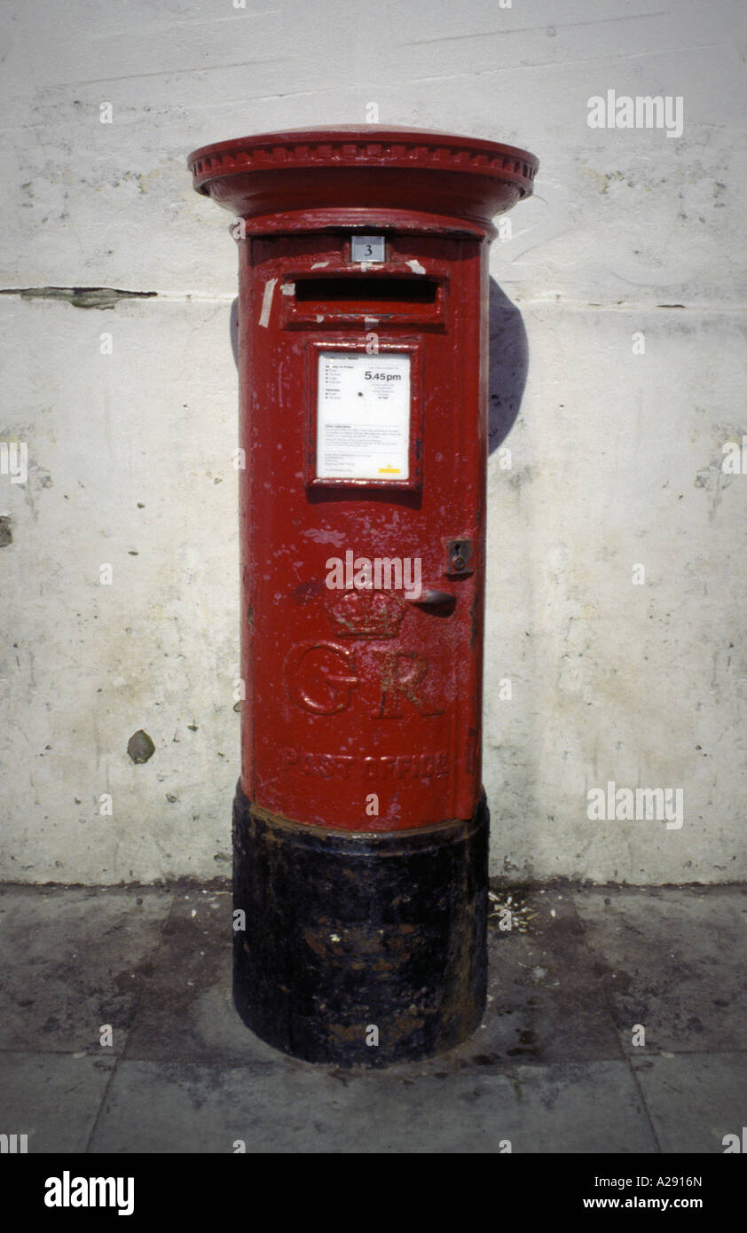 a traditional British red post box Stock Photo - Alamy