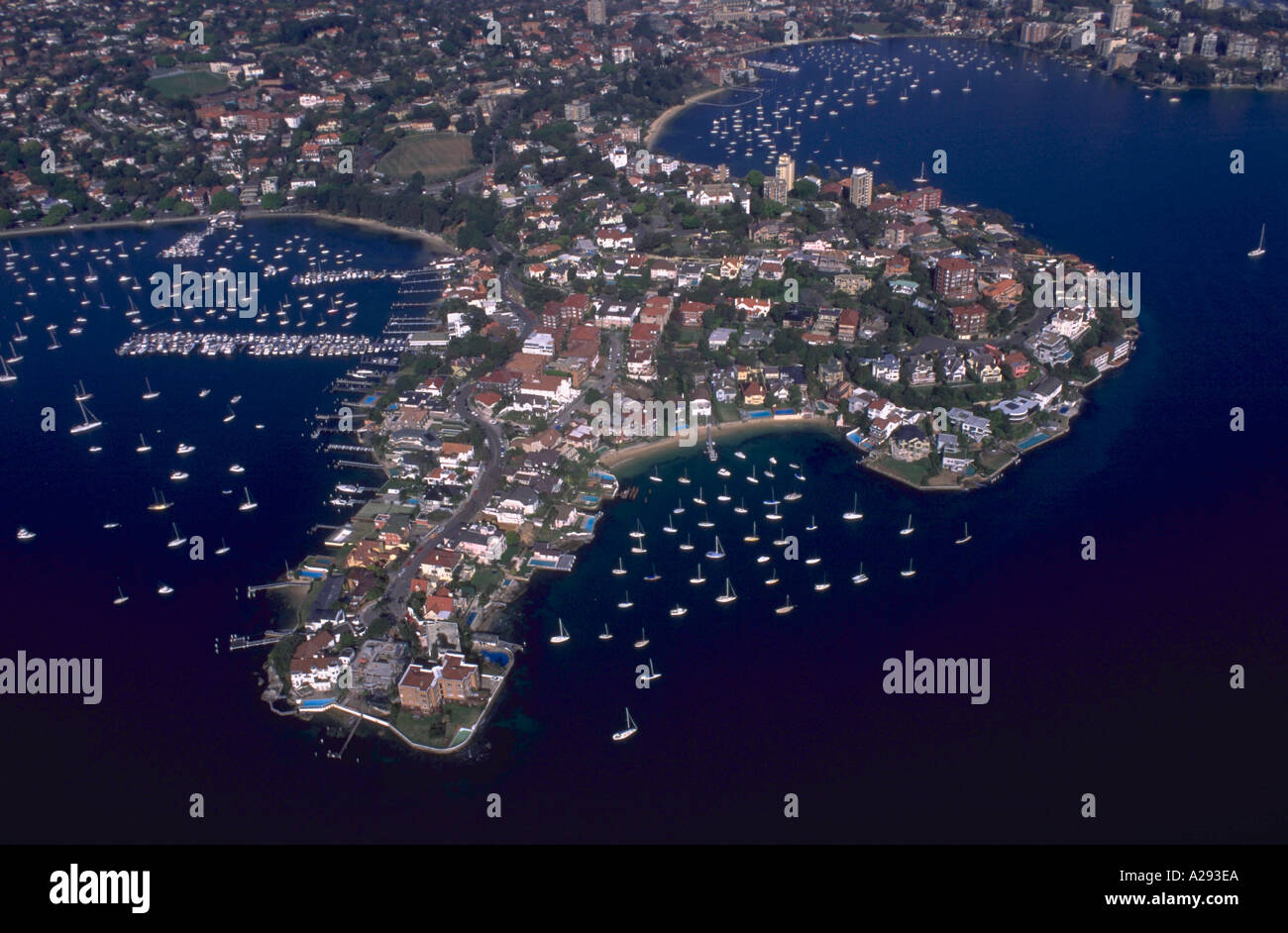 Aerial view of sailboats and homes in elite housing area of Point Piper ...