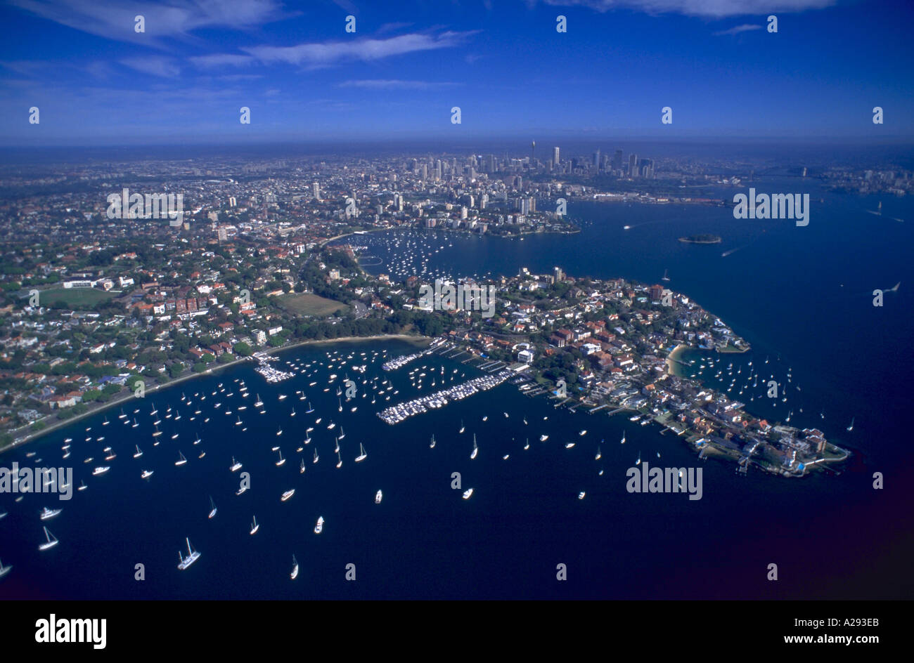 Aerial view of sailboats and homes in elite housing area of Point Piper ...