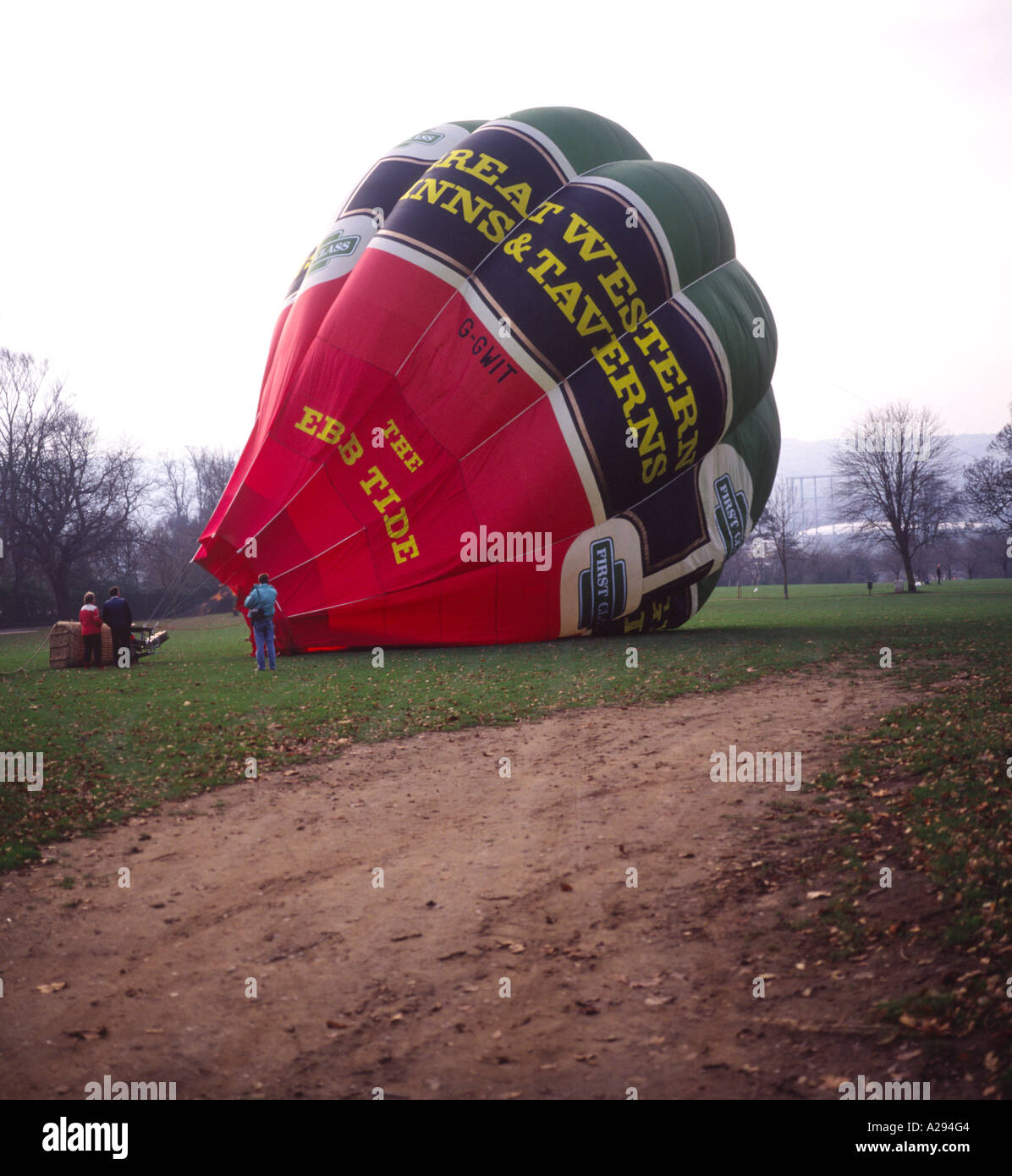 Red hot air balloon trying to take off Stock Photo - Alamy