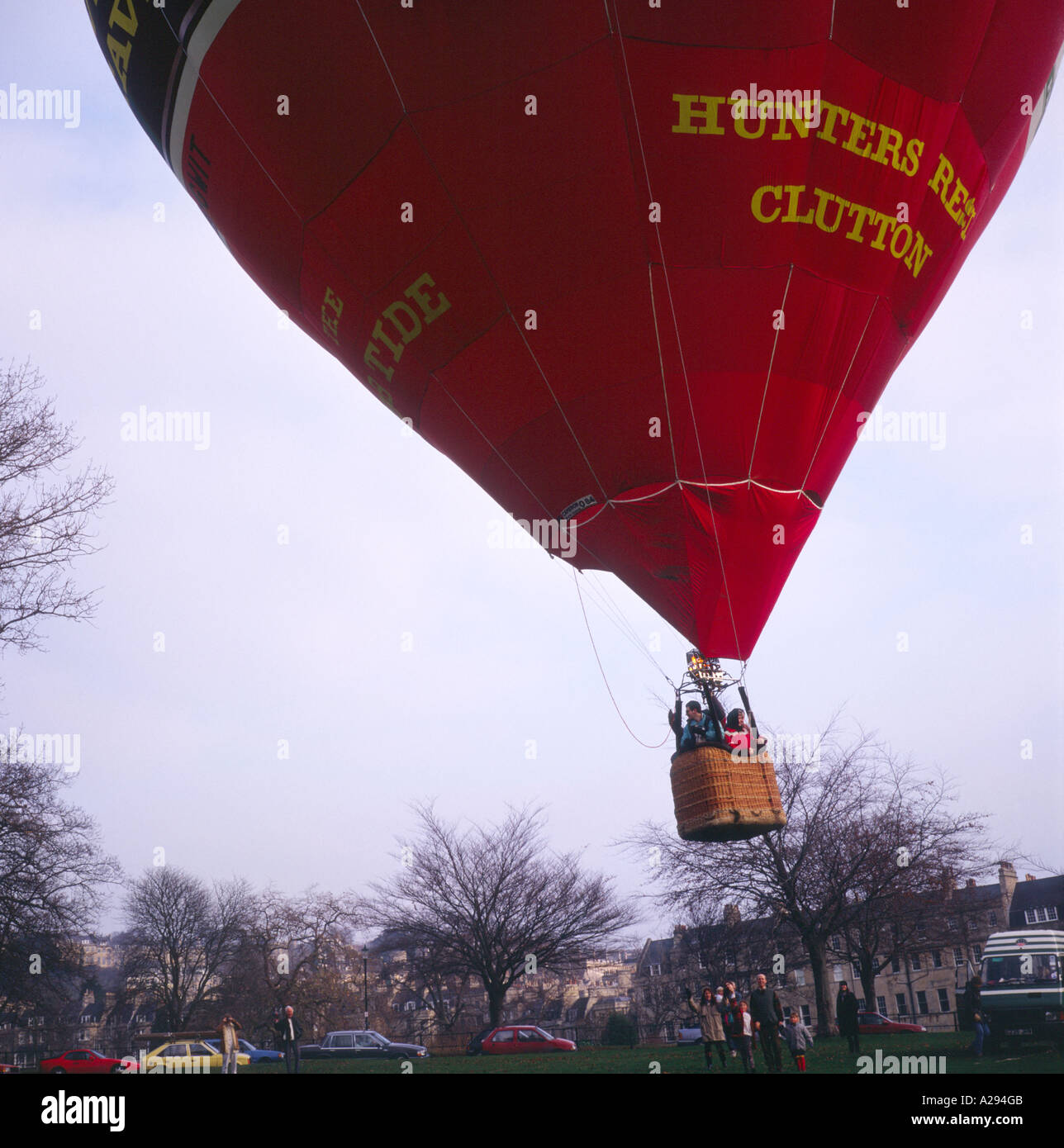 Red hot air balloon taking off Stock Photo - Alamy