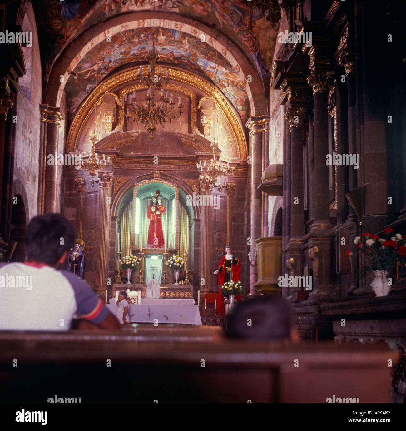 Praying at altar hi-res stock photography and images - Alamy