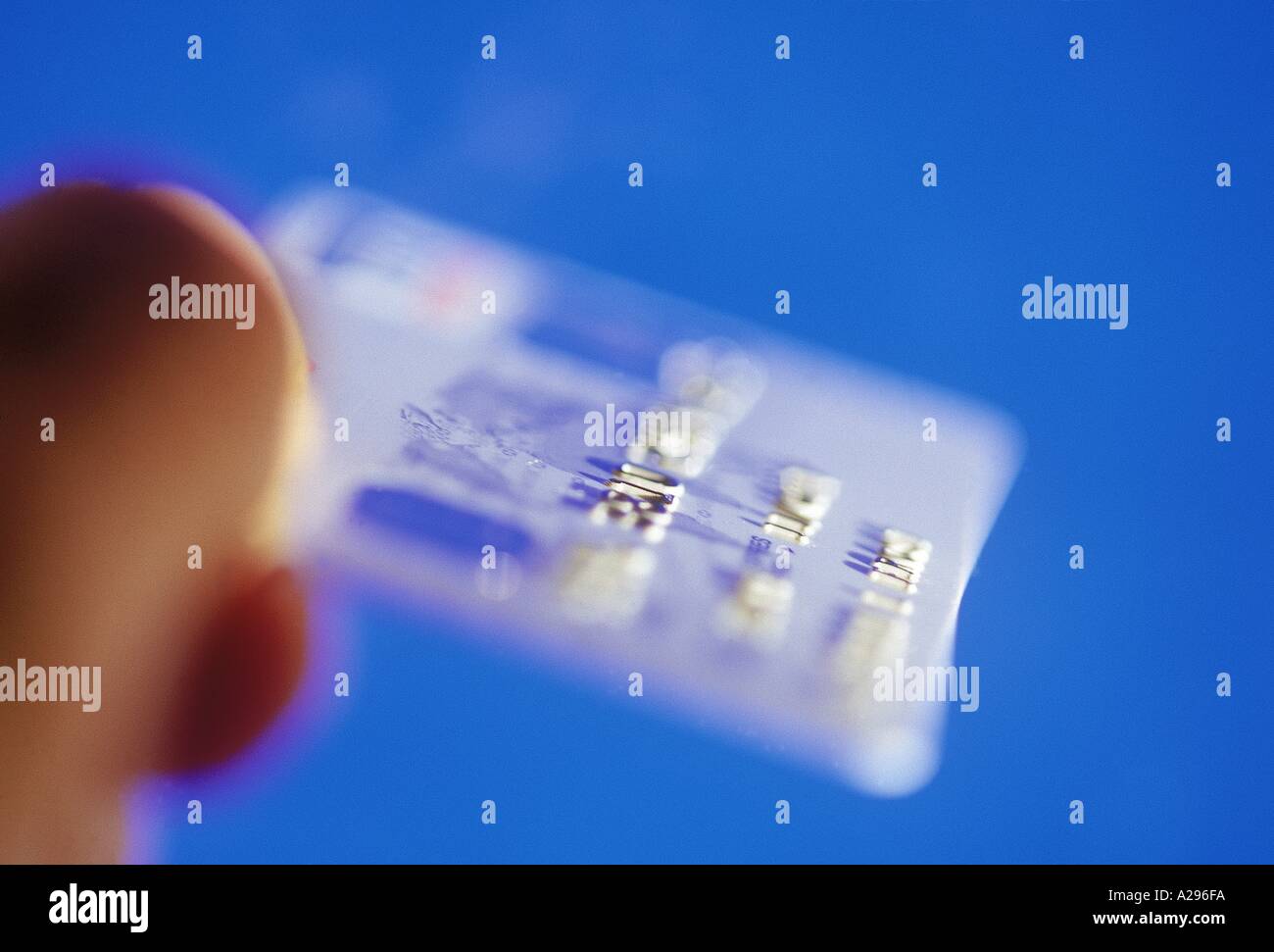 Person handing over credit card L Frost Stock Photo - Alamy