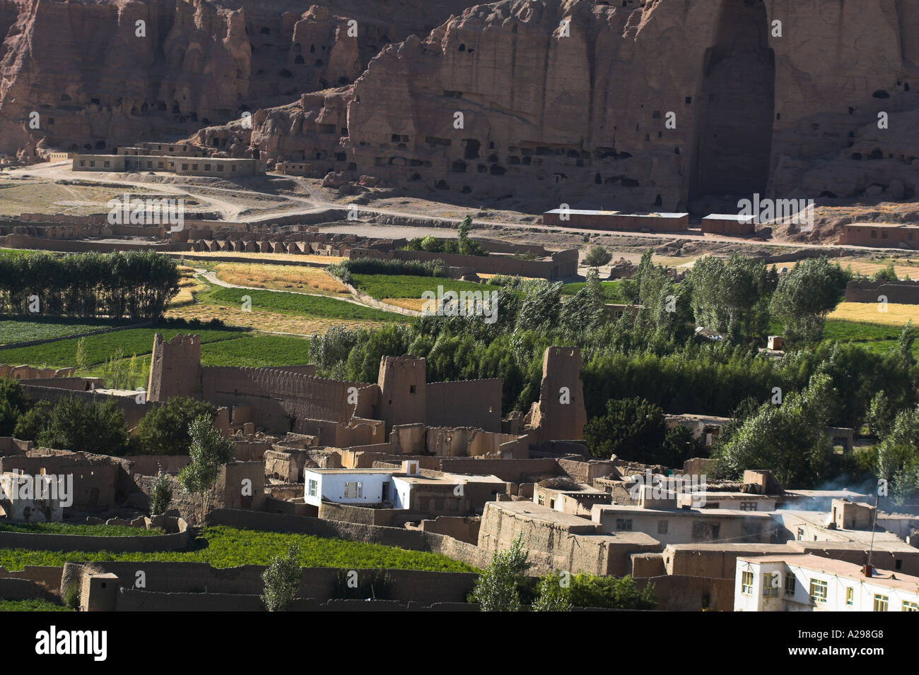 AFGHANISTAN Bamiyan Province Bamiyan Village at base of cliffs near ...