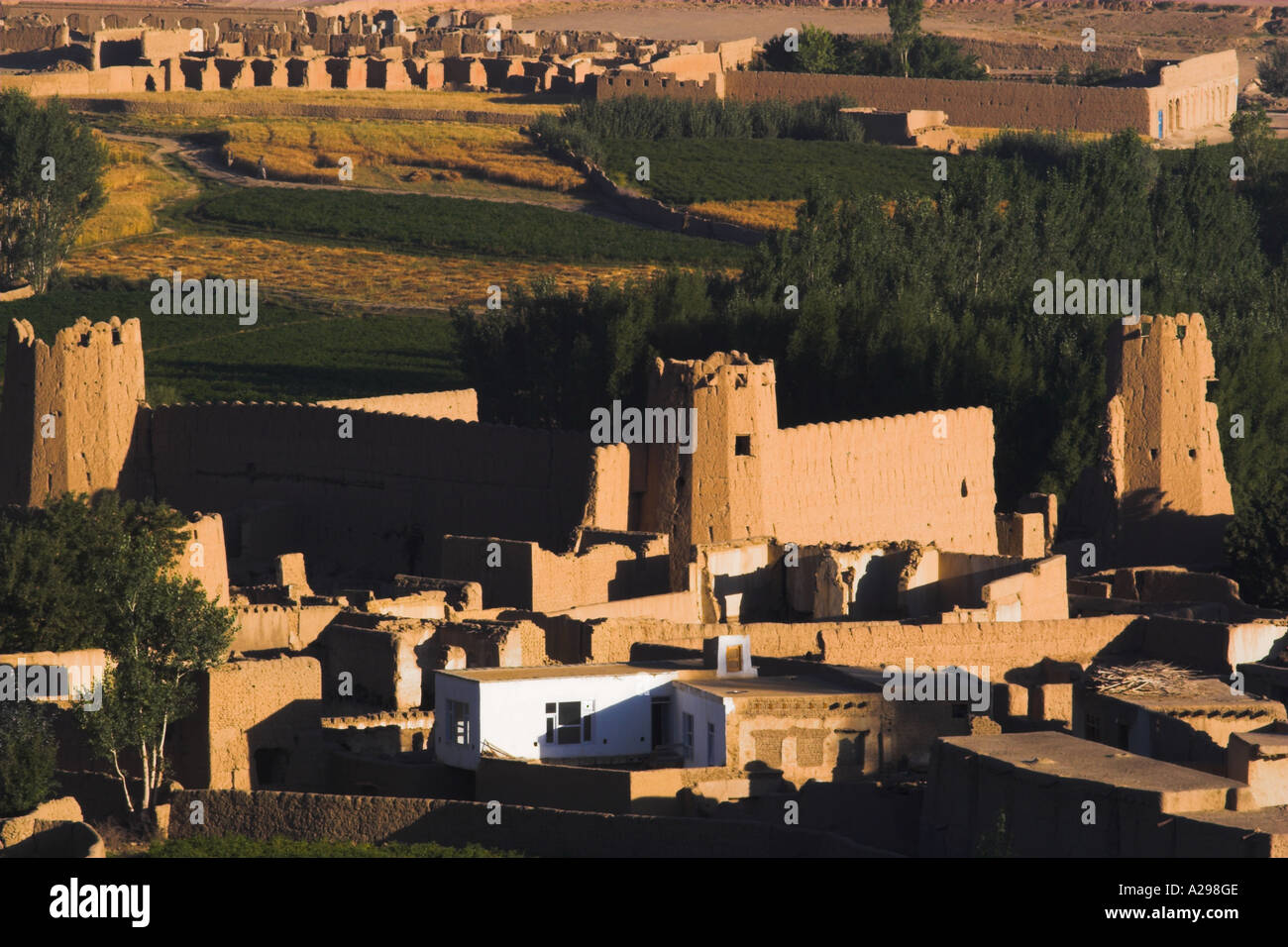 AFGHANISTAN Bamiyan Province Bamiyan Village at base of cliffs near ...