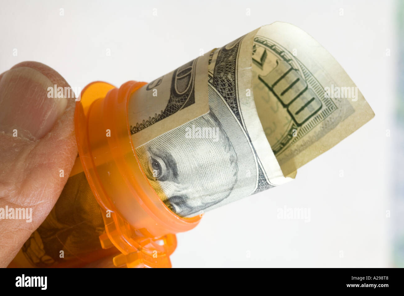 conceptual closeup view of prescription pill bottle containing one ...