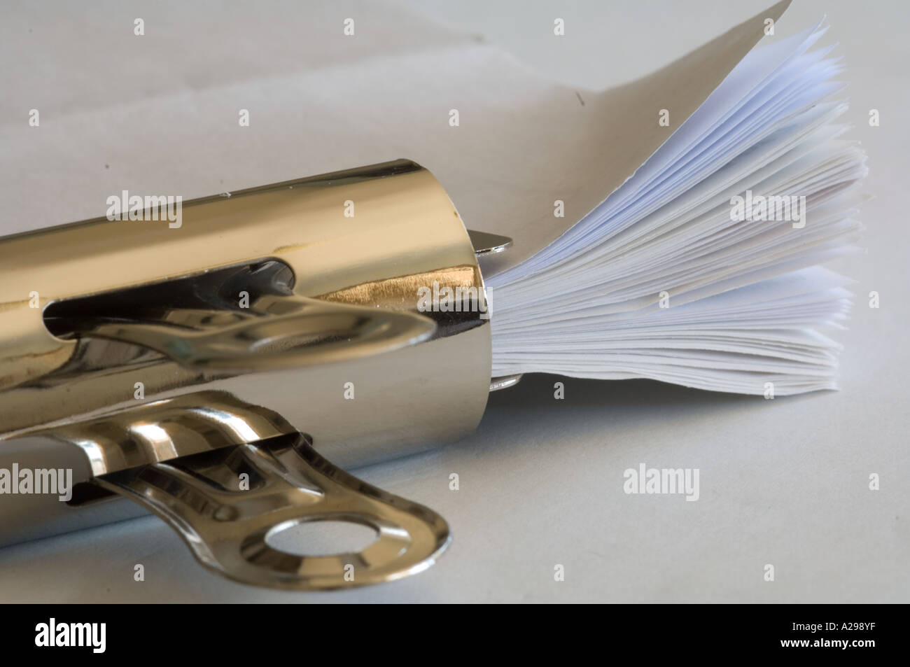 stack of invoices clamped together Stock Photo - Alamy