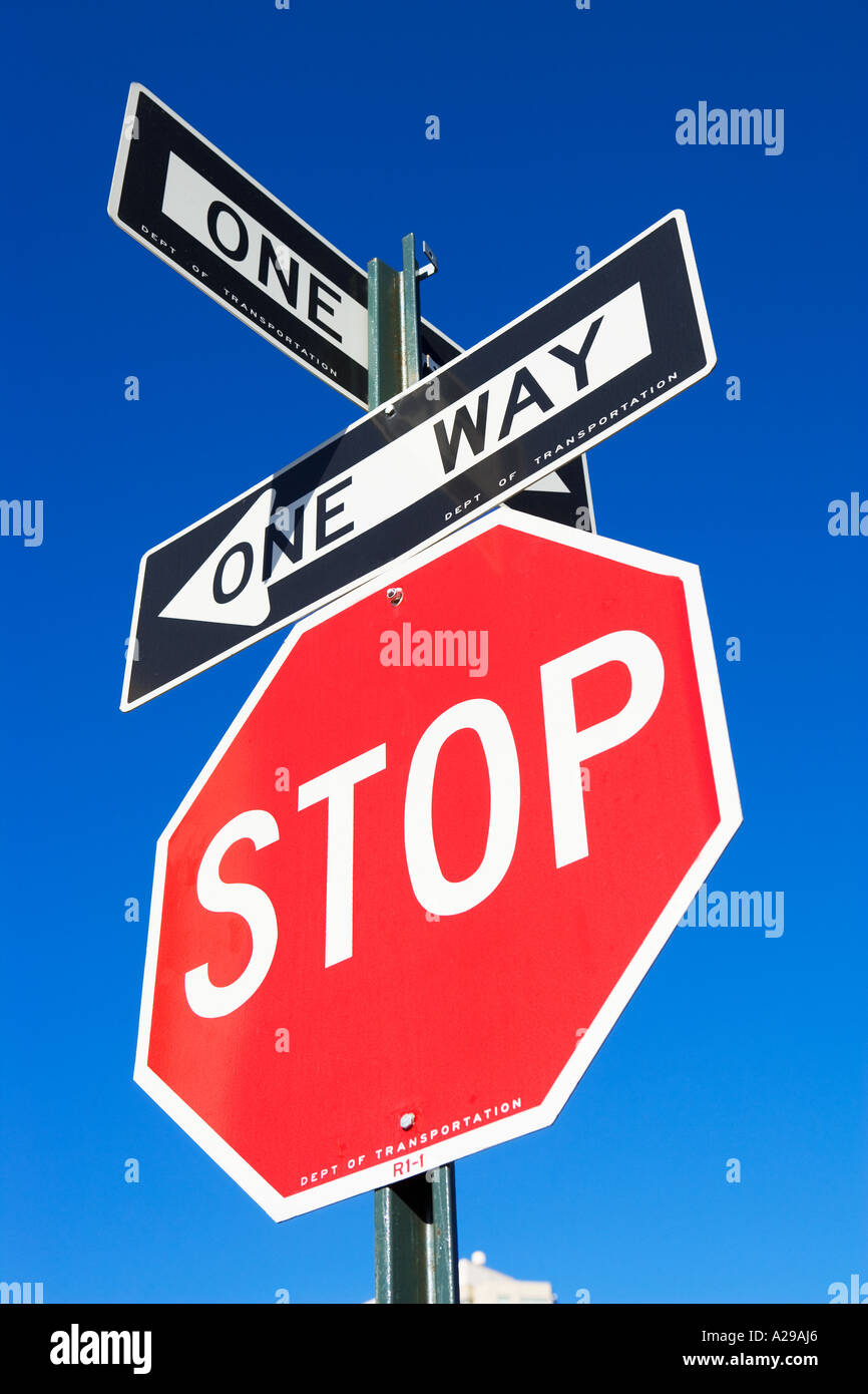 STOP SIGN WITH TWO ONE WAY SIGNS Stock Photo - Alamy