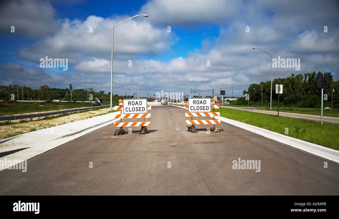 SIGNS ON ROADWAY, ROAD CLOSED Stock Photo - Alamy