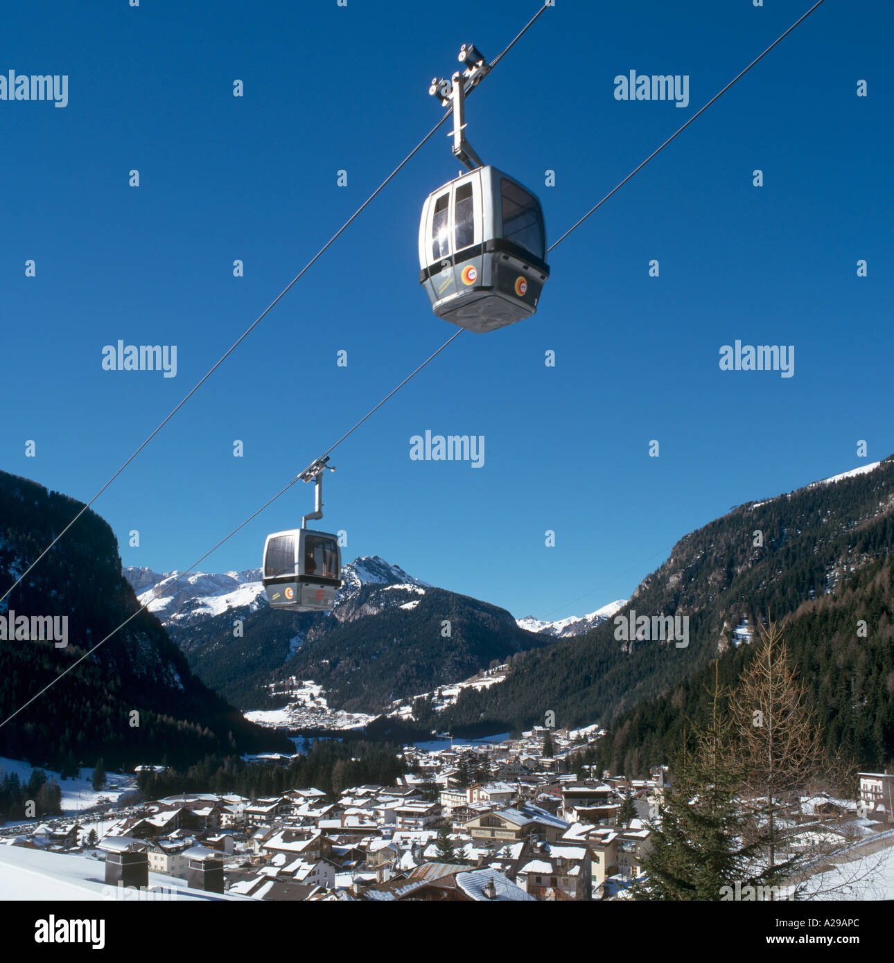 Gondolas and View over the resort of Canazei, Val di Fassa, Dolomites ...