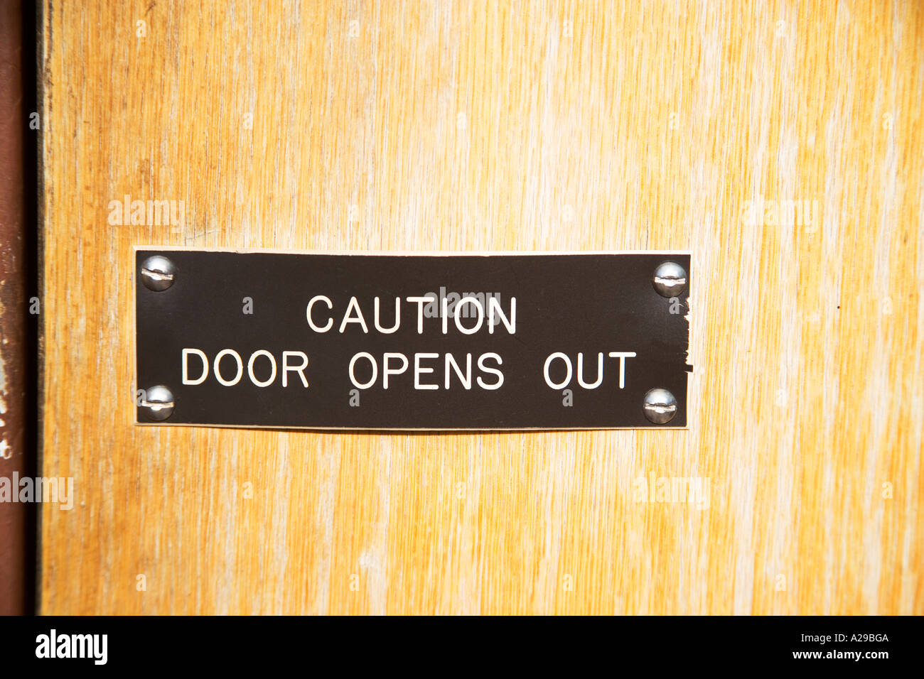 CAUTION DOOR OPEN OUT SIGN Stock Photo - Alamy
