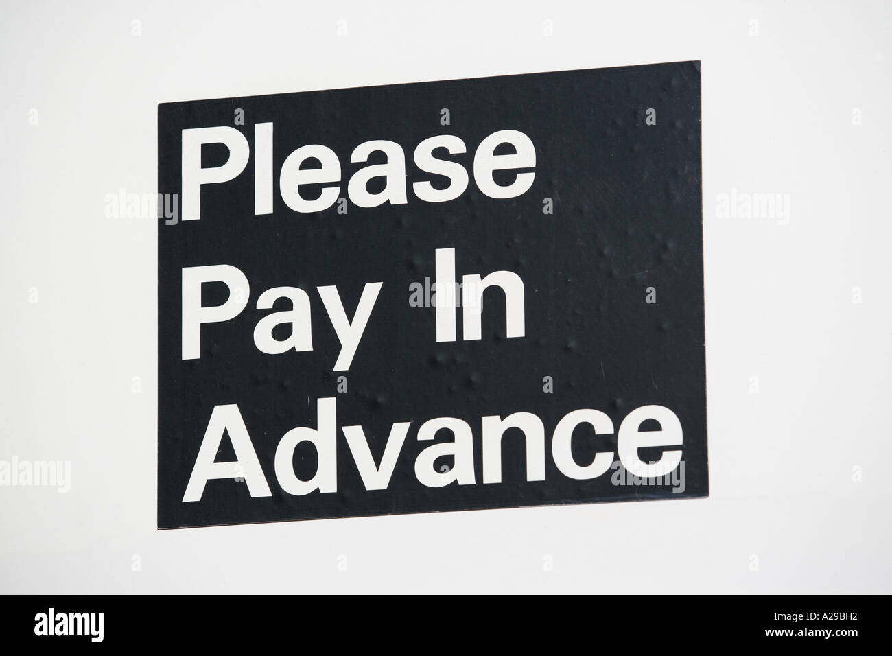 PLEASE PAY IN ADVANCE SIGN Stock Photo - Alamy