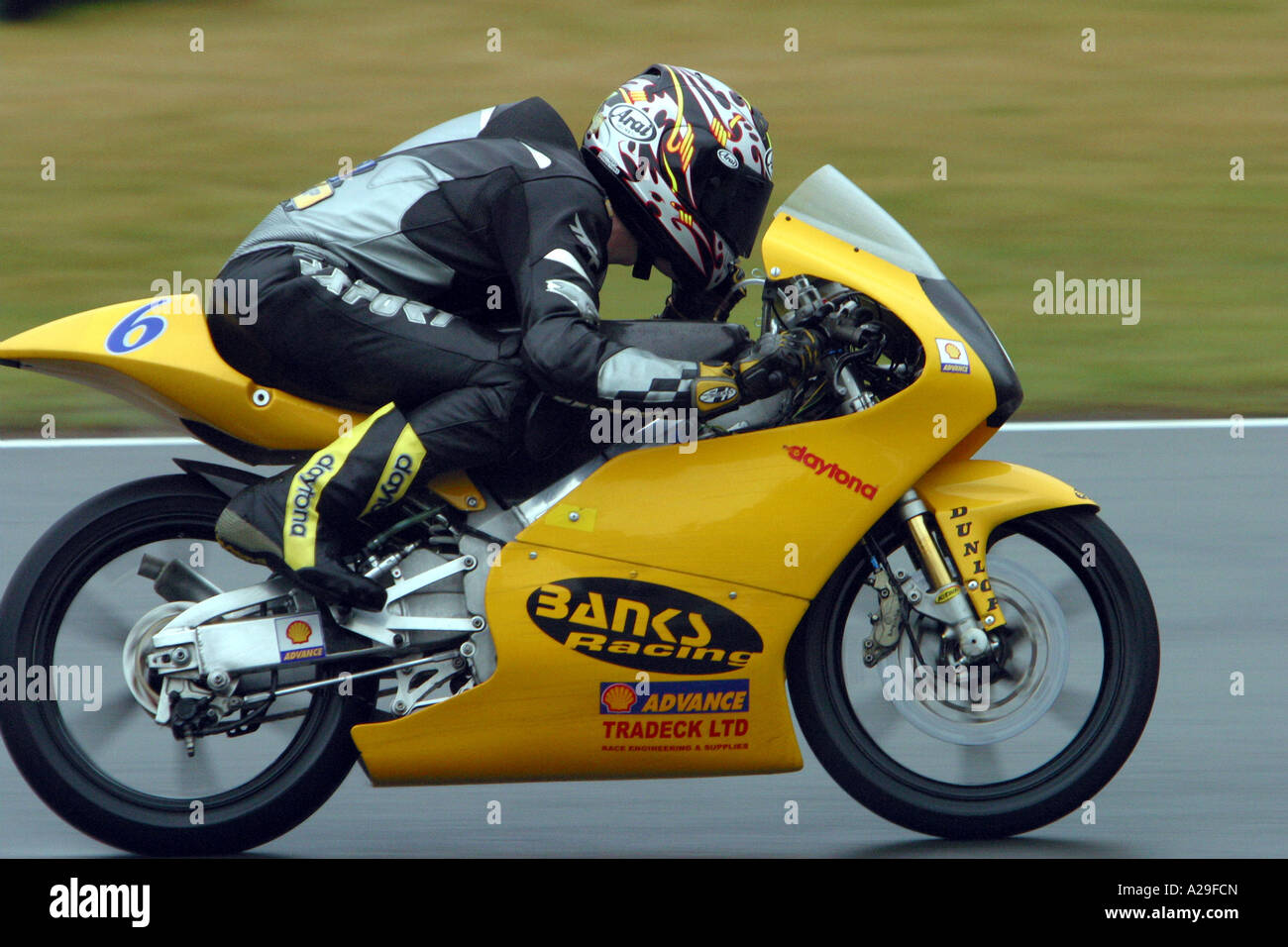 125cc motorcycle racer at speed in the british championship Stock Photo ...