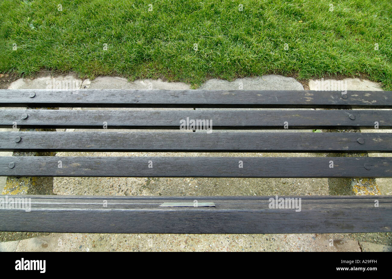 A slatted wooden bench viewed from above Unusual angle Stock Photo - Alamy