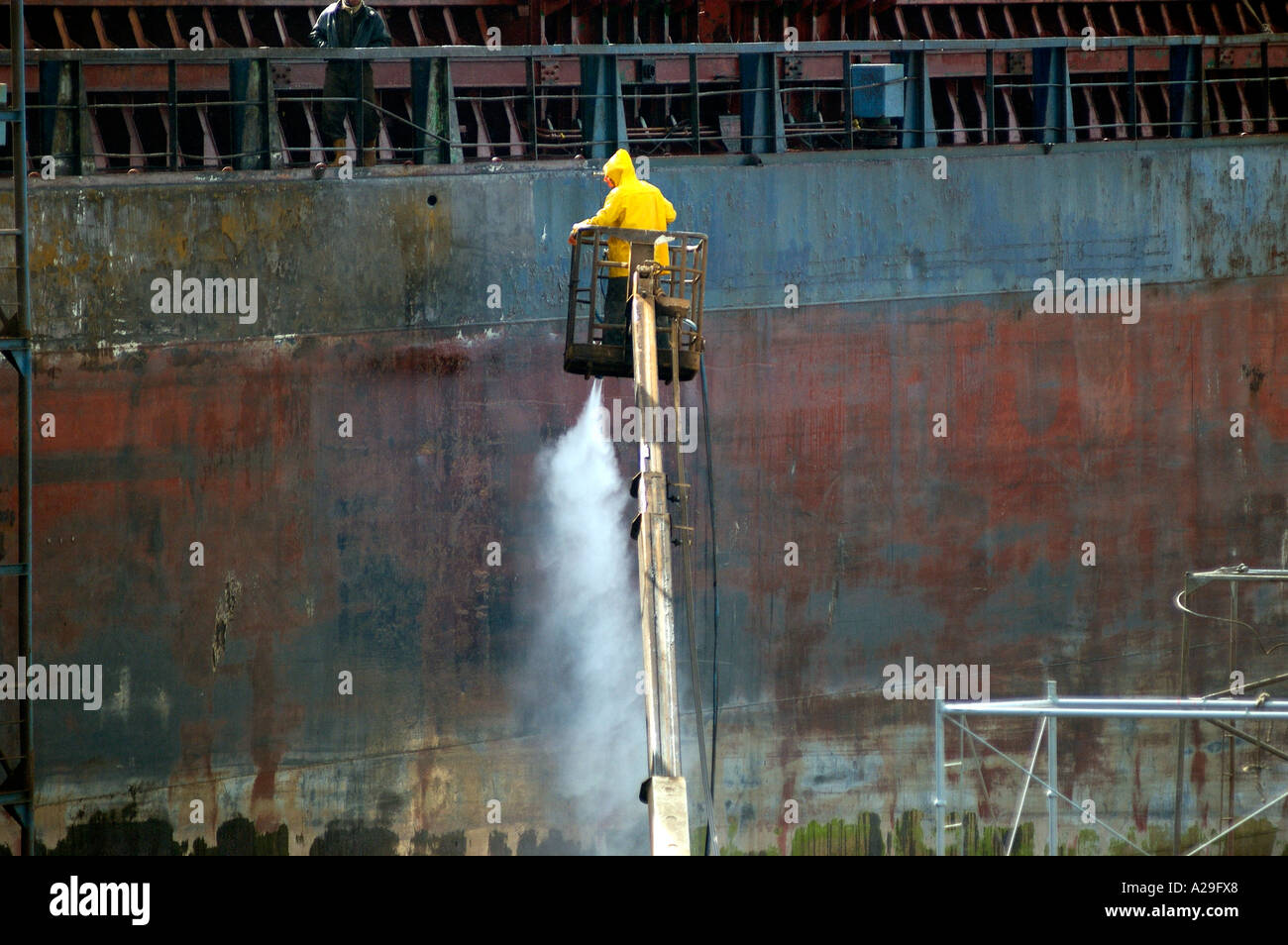 worker cleaning the ship Stock Photo - Alamy