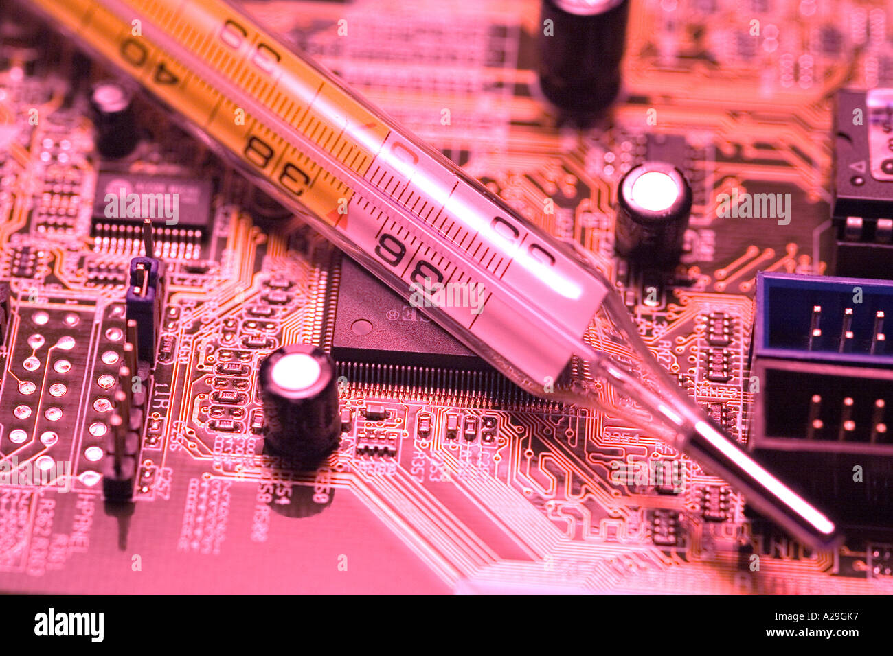 Detecting computer problems - Thermometer over main chip board Stock ...