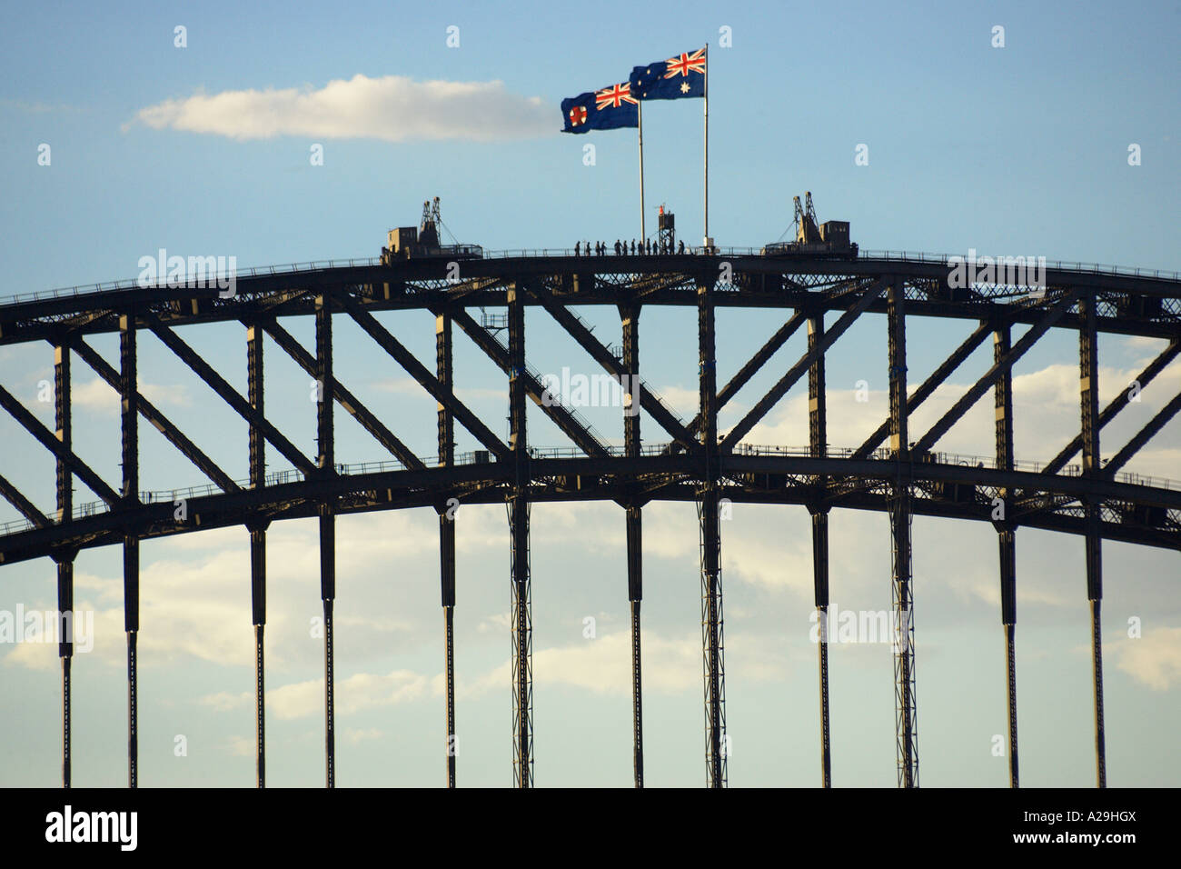 Sydney Harbour Bridge showing top of bridge with flags flying Stock ...