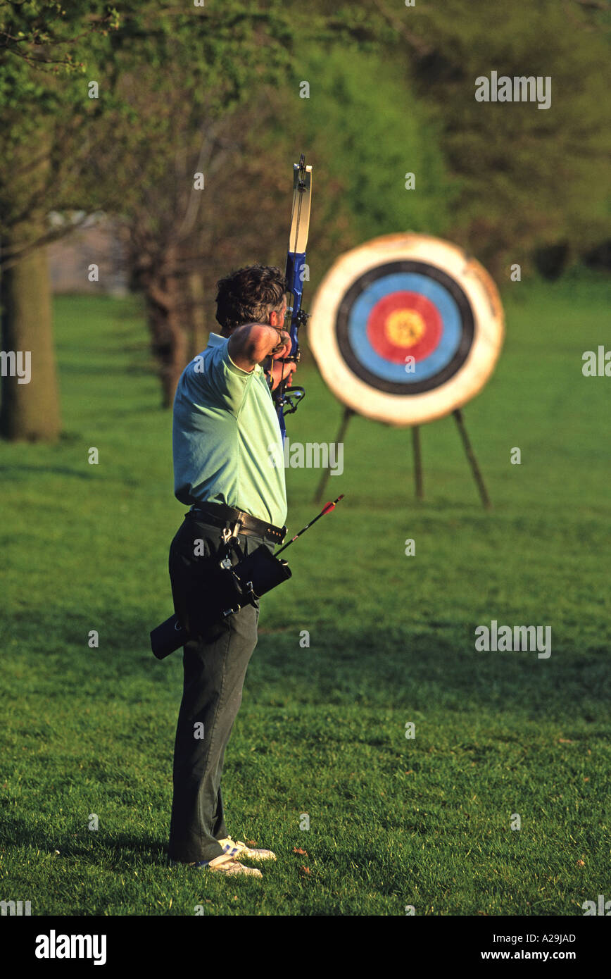 Male archer taking aim at a target hi-res stock photography and images ...