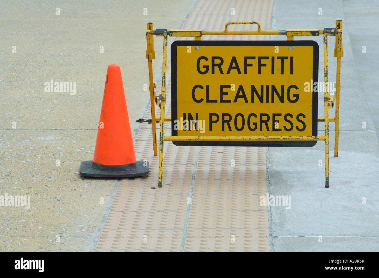 Graffiti cleaning sign near Australian beach Stock Photo - Alamy