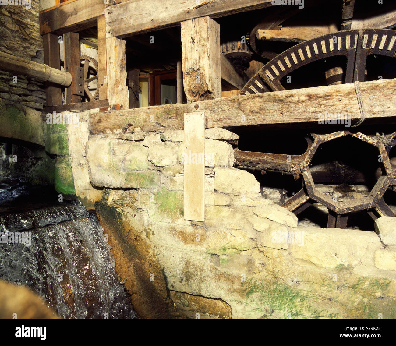 Water mill interior wheel mechanism Stock Photo - Alamy