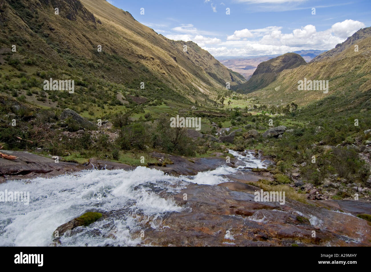 A waterfall and rugged mountain scenery while on the "community" Inca ...