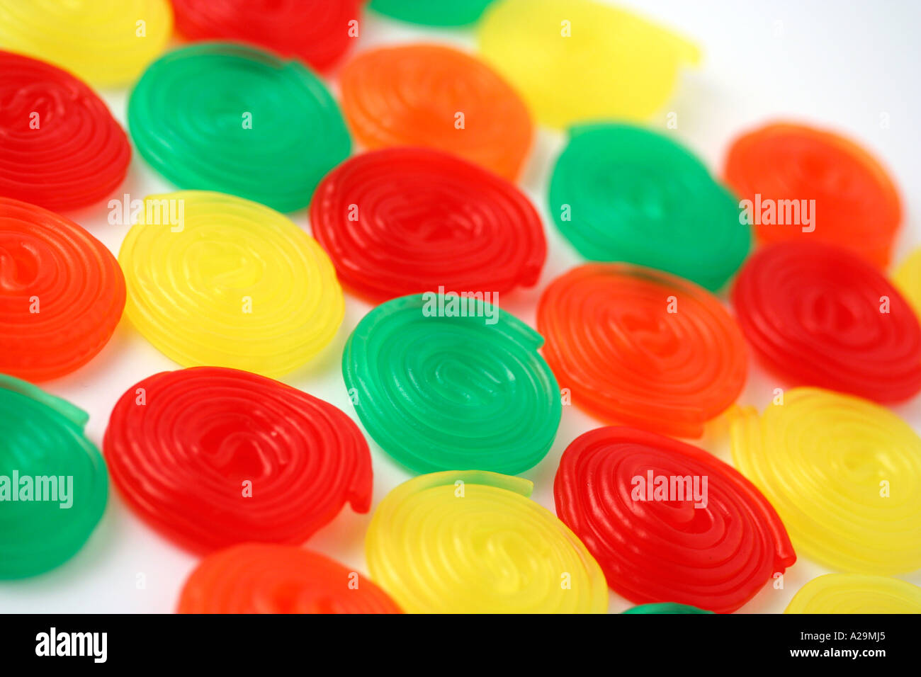 Yellow spiral gummy candy hi-res stock photography and images - Alamy
