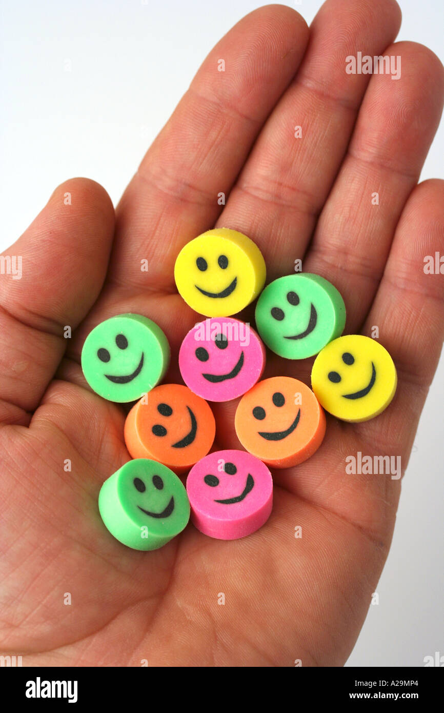 Holding Smileys High Resolution Stock Photography and Images - Alamy