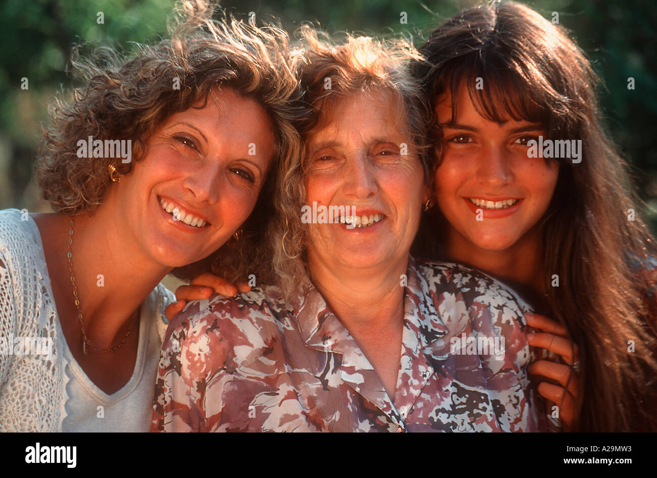 Three women facing camera hi-res stock photography and images - Alamy