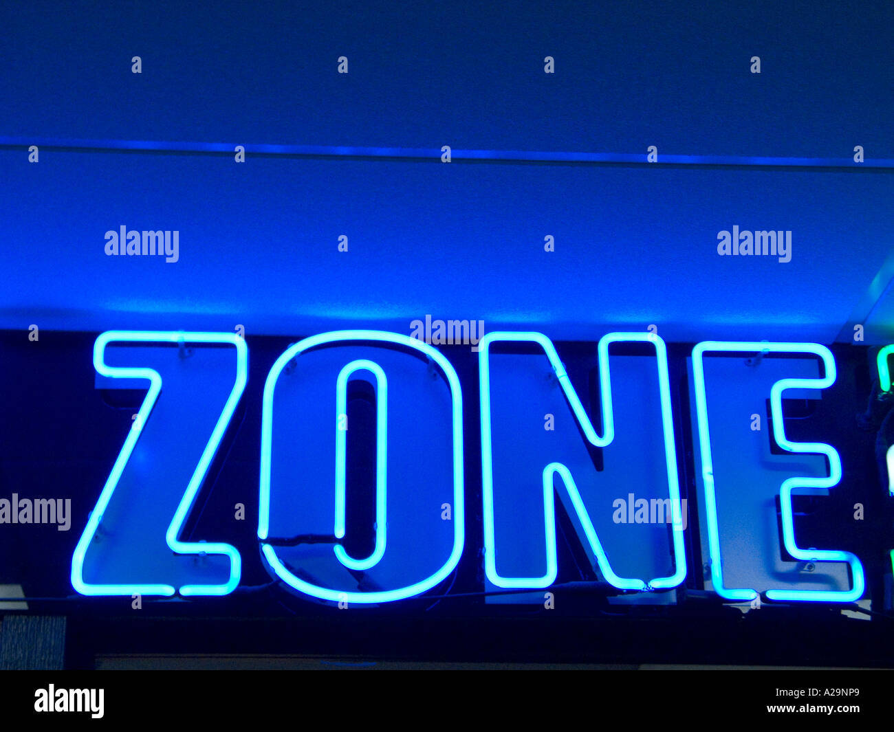Neon sign spelling ZONE Stock Photo - Alamy
