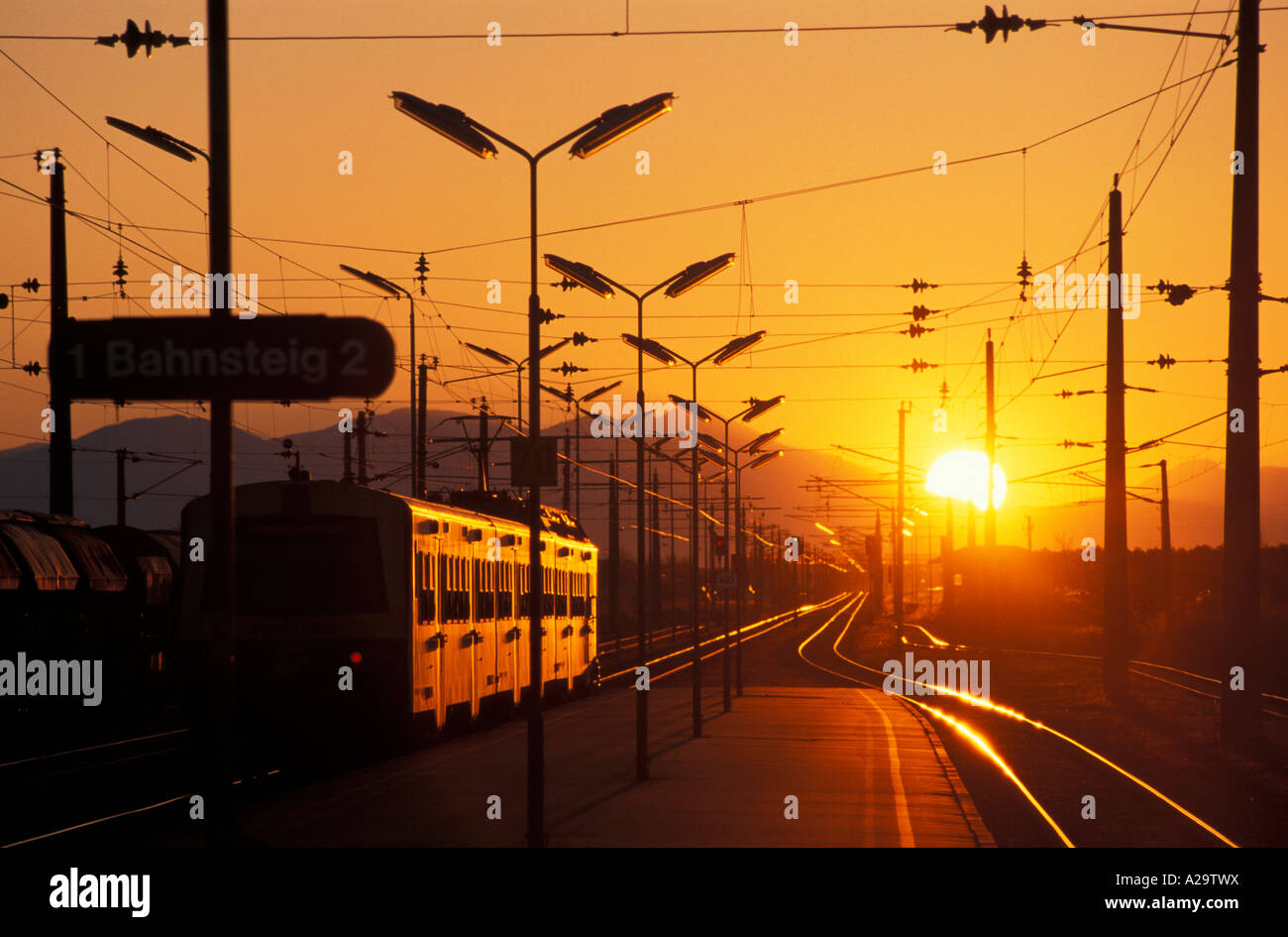 train station at sunset Stock Photo - Alamy
